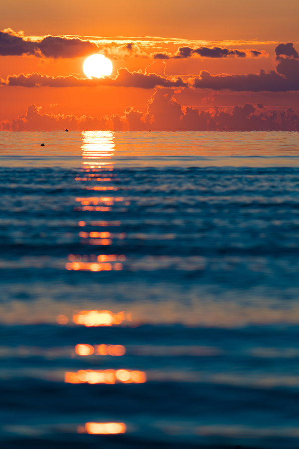 orange sunset on sea, vertical – Andy McPhee